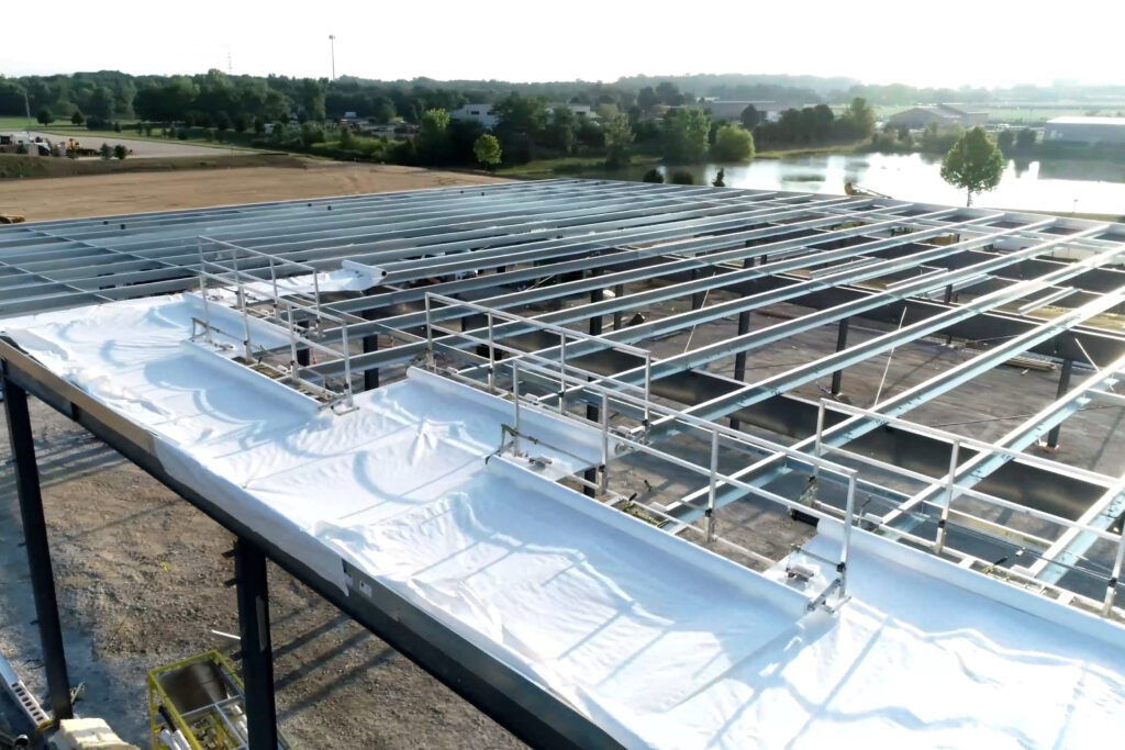 System insulates roofs, provides fall protection - Metal Construction News